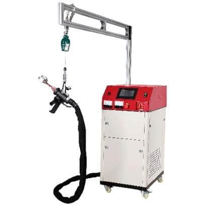 Mobile induction machine with water-cooled flexible cab...