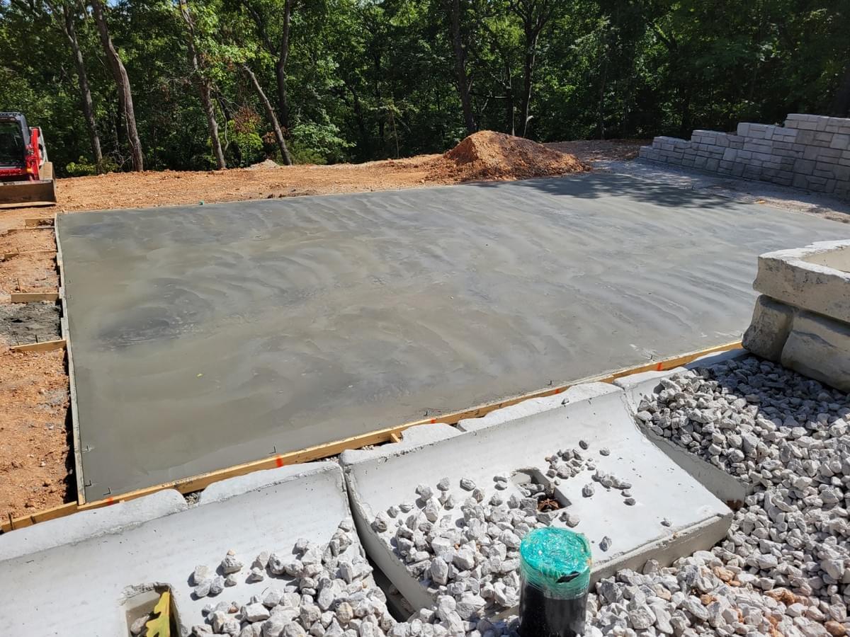 What's the process of tearing and pouring new concrete?