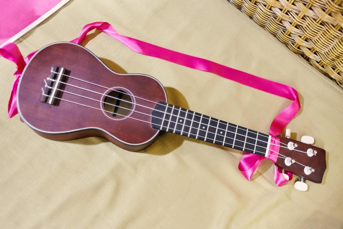 ukulele strap button placement