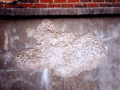 Cracked and pitted foundation